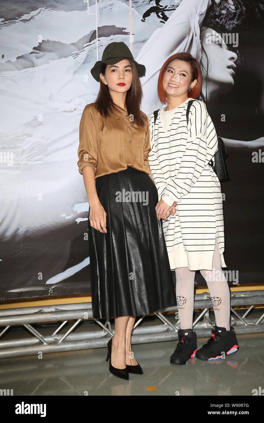 Ella Chen, left, and Selina Jen of Taiwanese girl group S.H.E pose as ...