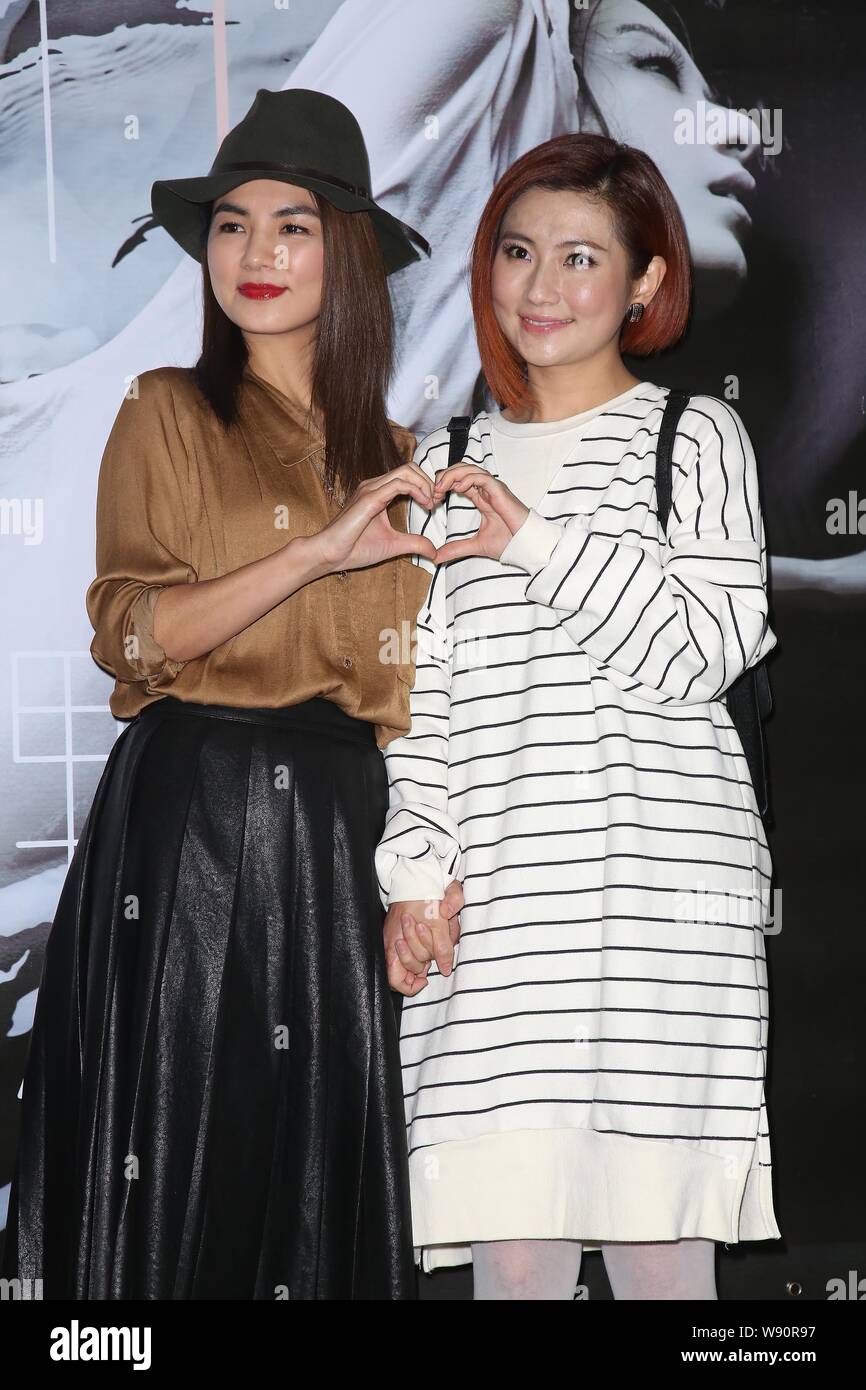 Ella Chen, left, and Selina Jen of Taiwanese girl group S.H.E pose as ...