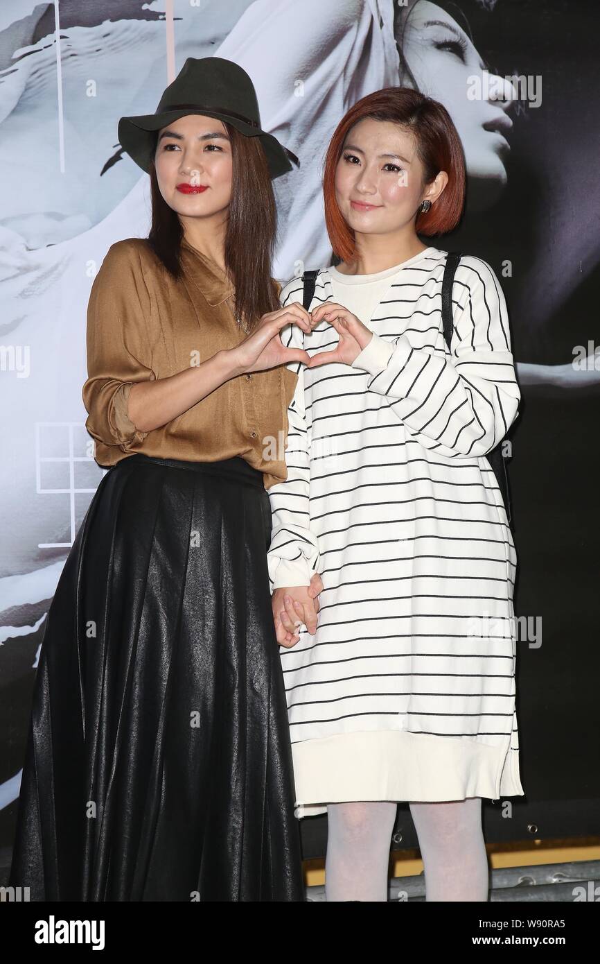 Ella Chen, left, and Selina Jen of Taiwanese girl group S.H.E pose as ...