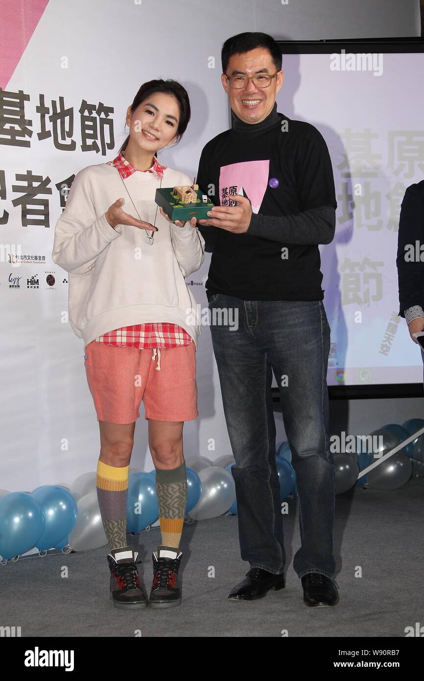 Ella Chen of Taiwanese girl group S.H.E, left, poses during a press ...