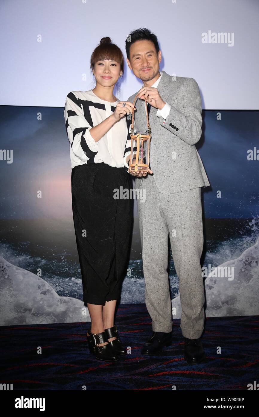 Hong Kong actress Karena Lam, left, and singer Jacky Cheung pose during ...