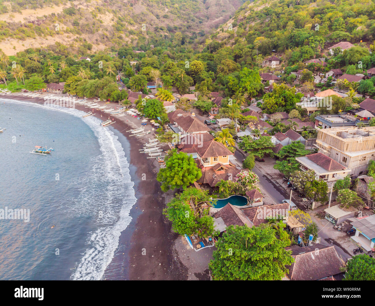 Aerial view of Amed beach in Bali, Indonesia. Traditional fishing boats ...