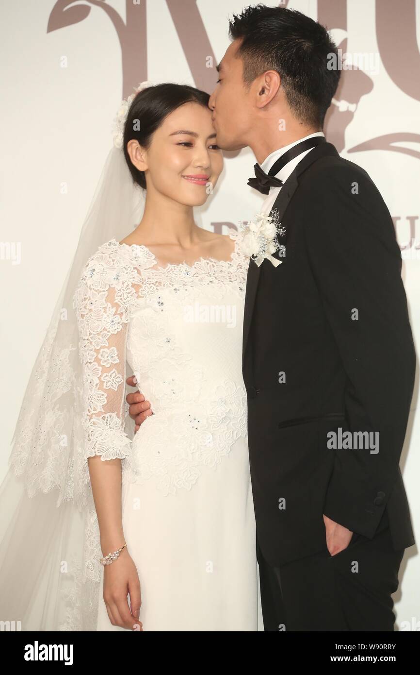 Chinese actress Gao Yuanyuan, left, is kissed by her Taiwanese actor ...