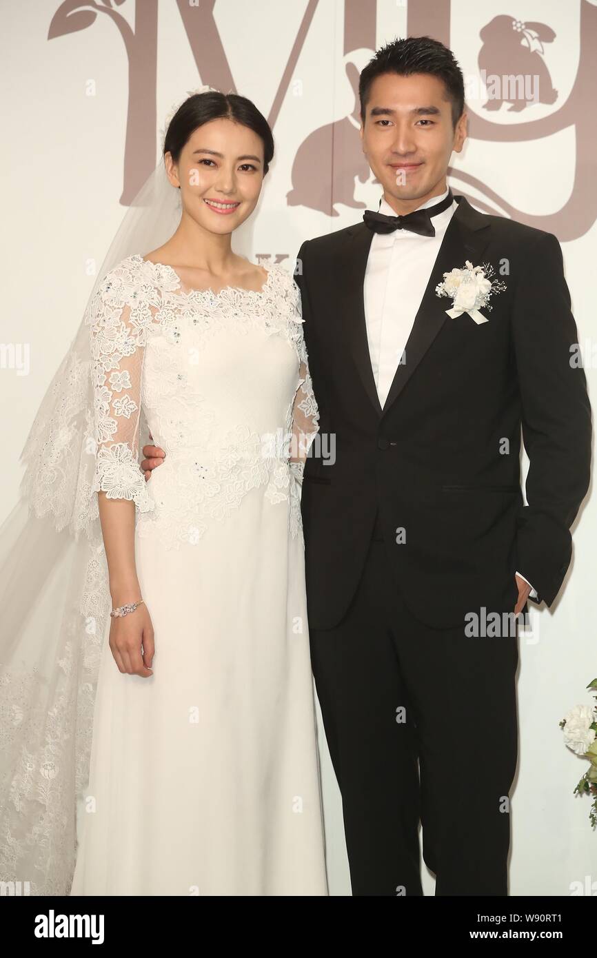 Chinese actress Gao Yuanyuan, left, and her Taiwanese actor husband ...