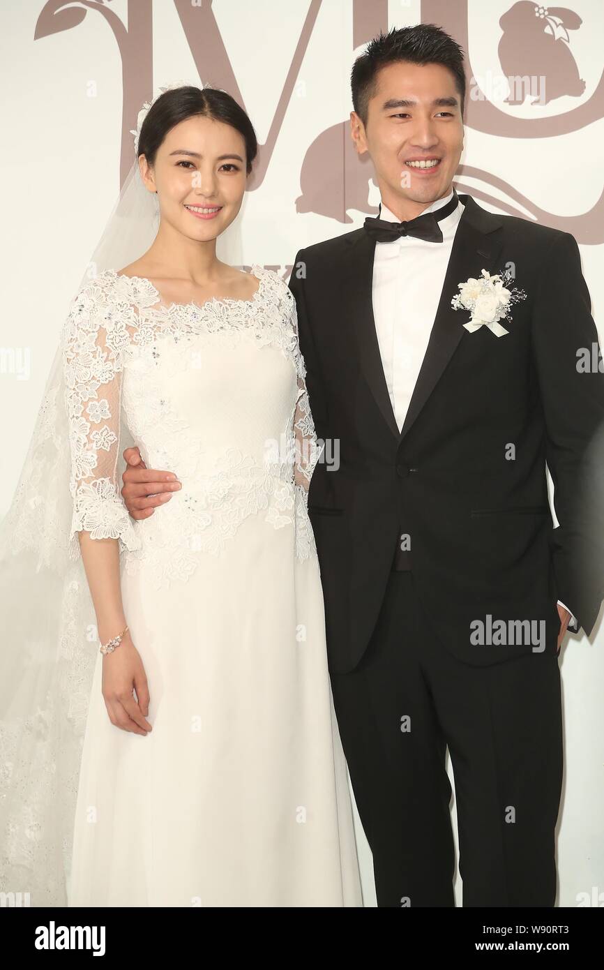 Chinese actress Gao Yuanyuan, left, and her Taiwanese actor husband ...