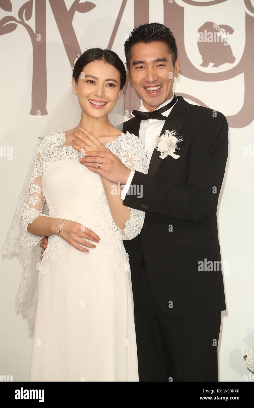 Chinese actress Gao Yuanyuan, left, and her Taiwanese actor husband ...