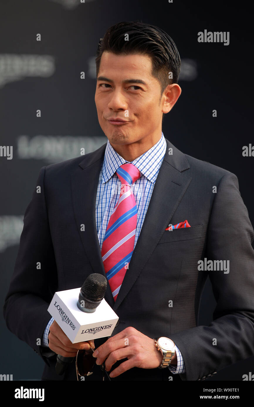 Hong Kong singer and actor Aaron Kwok poses during the opening ceremony ...