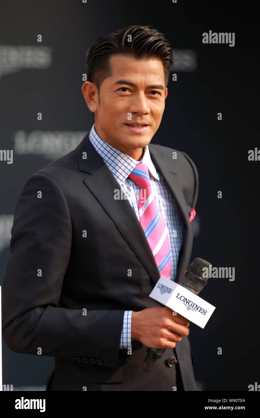 Hong Kong singer and actor Aaron Kwok poses during the opening ceremony ...
