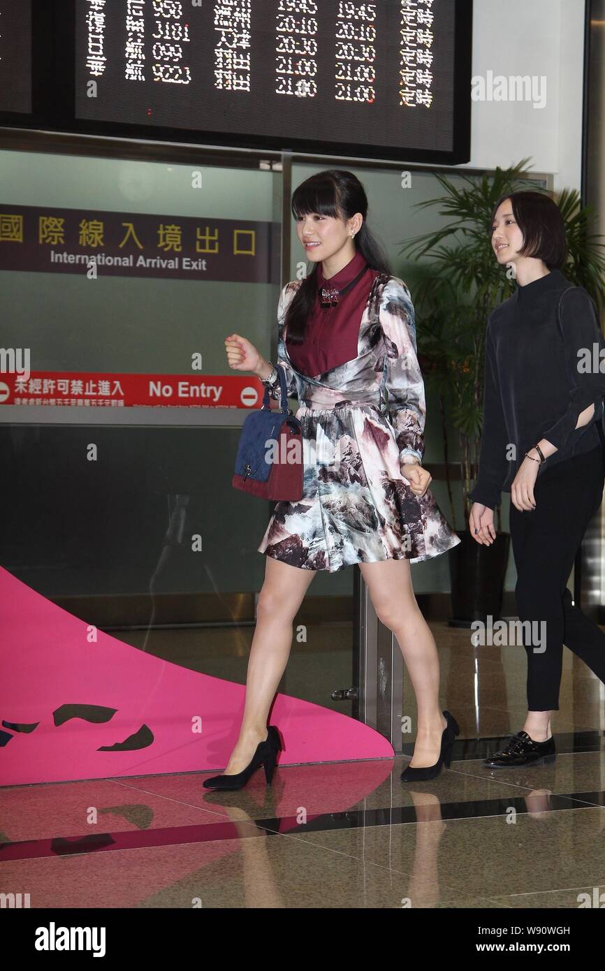 Ayaka Nishiwaki, left, and Ayano Omoto of Japanese pop girl group Perfume arrive at the Taipei ...