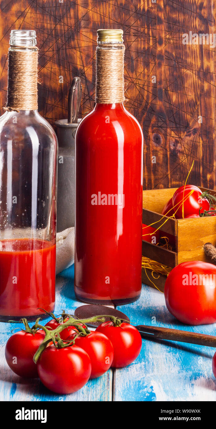 Fresh tomato juice. Drink in a glass bottle. Organic tomatoes. Vitamin ...