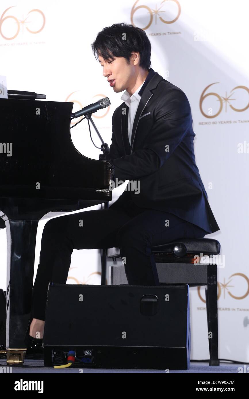 Taiwan-based American singer Leehom Wang performs at a press conference ...