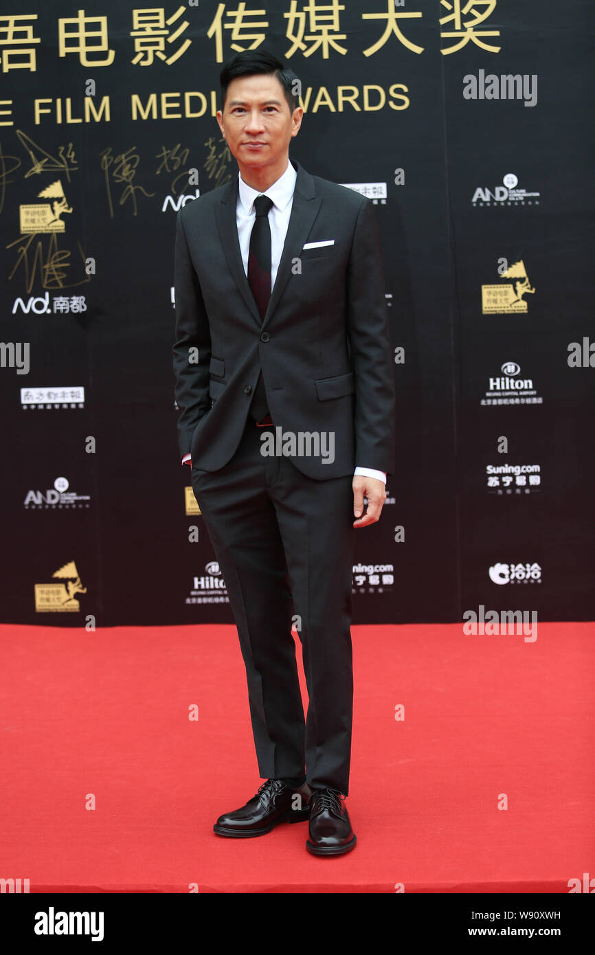Hong Kong actor Nick Cheung poses on the red carpet for the 14th ...