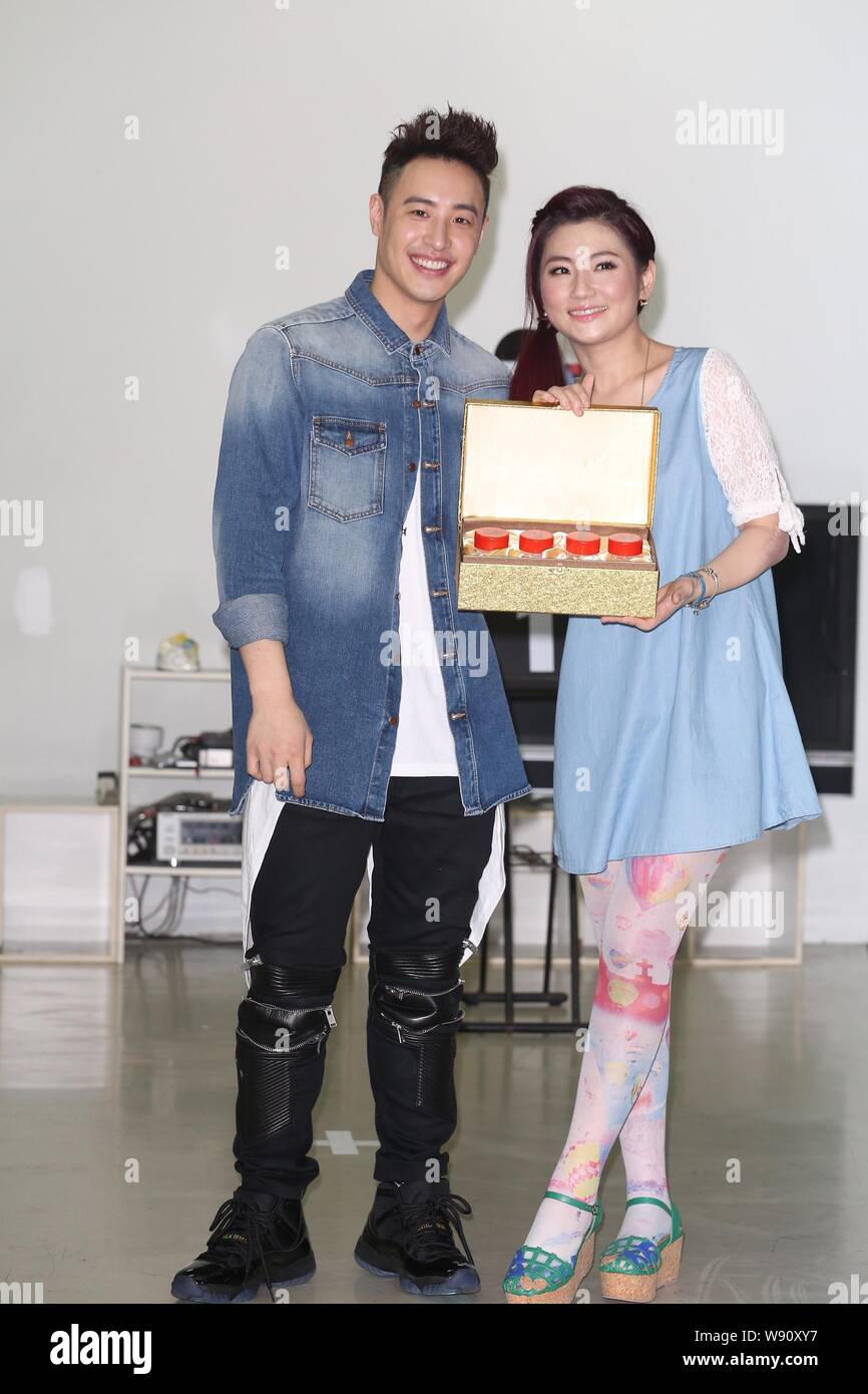 Taiwanese singer Wilber Pan, left, poses with Selina Jen of Taiwanese ...