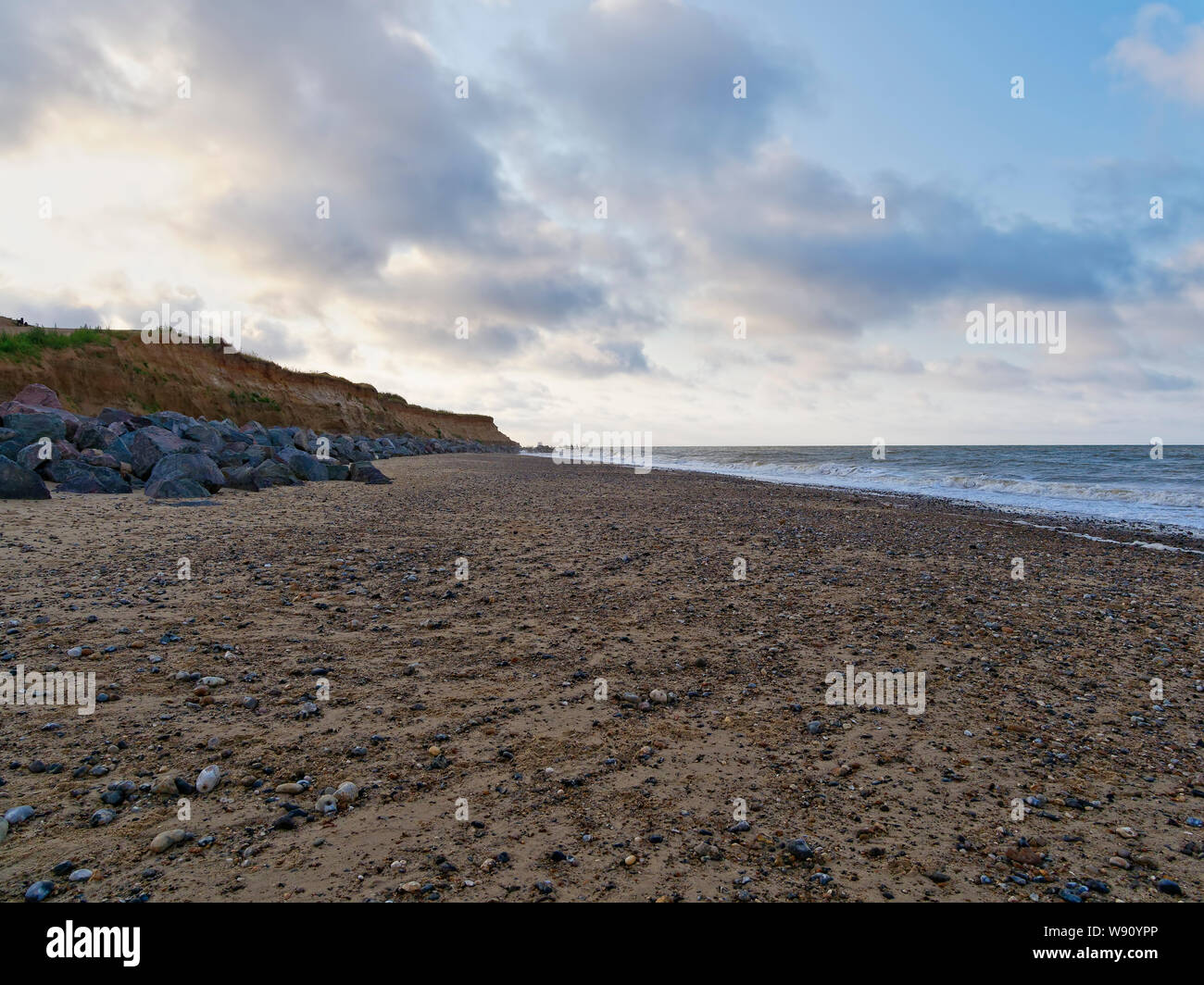 Large granite rocks help protect Happisburgh cliffs from coastal ...
