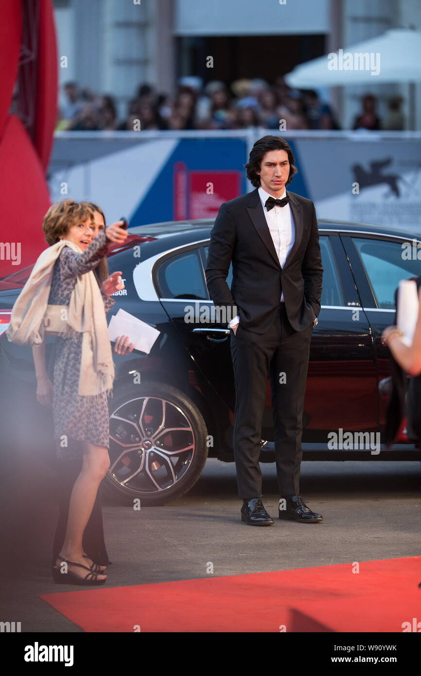 American actor Adam Driver, back, arrives for the screening of the ...
