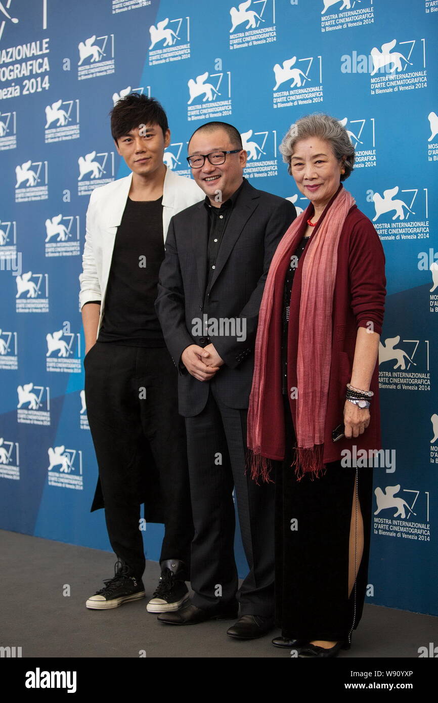 (From left) Chinese actor Qin Hao, director Wang Xiaoshuai and actress Lv Zhong pose at the ...