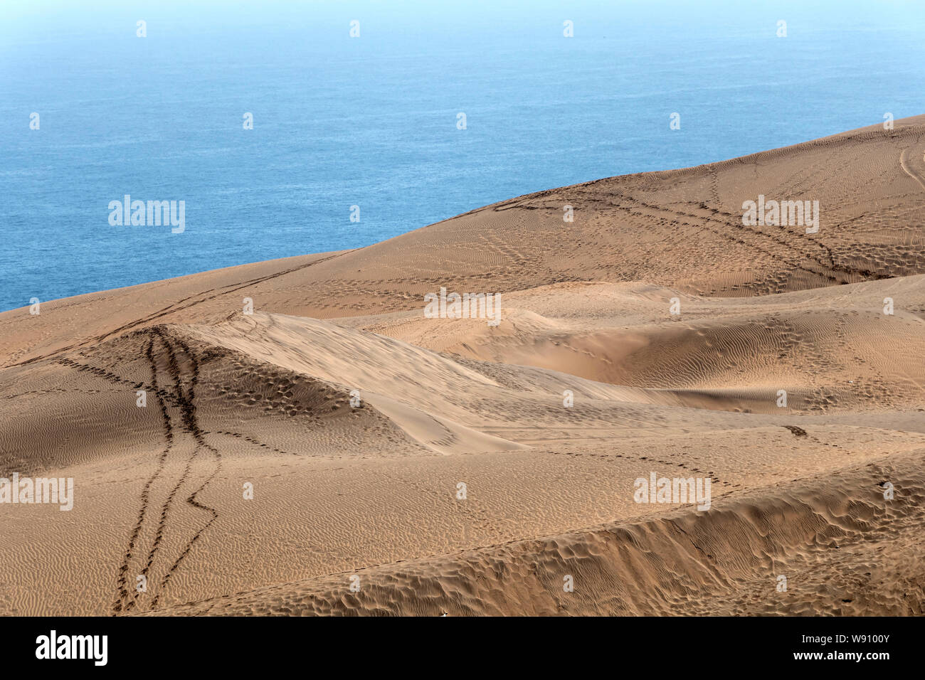 View across the desert landscape of Concon Dunes, a large area of sand ...