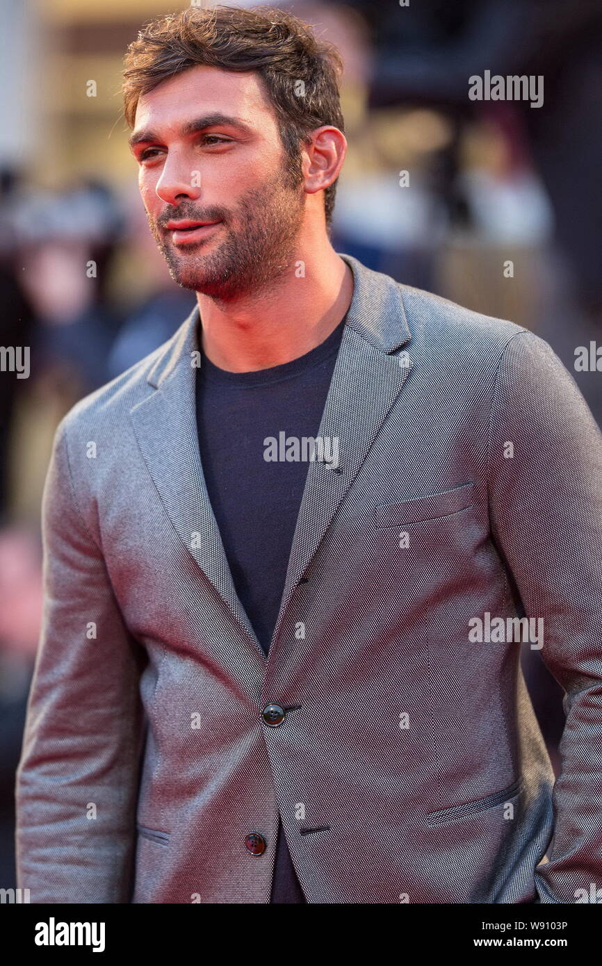 Italian model Francesco Arca arrives on the red carpet for the ...