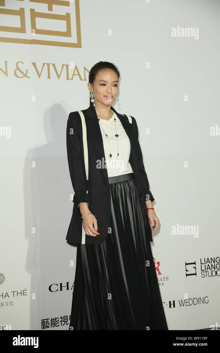 Taiwanese actress and model Shu Qi poses as she arrives at Vivian Hsus ...
