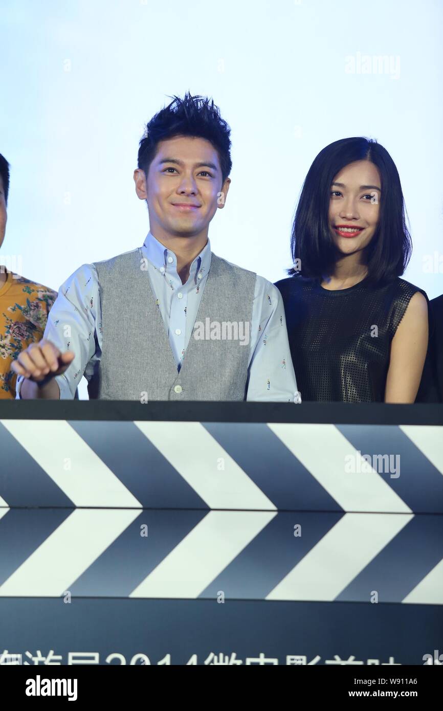 Taiwanese singer and actor Jimmy Lin, center, poses during a premiere ...