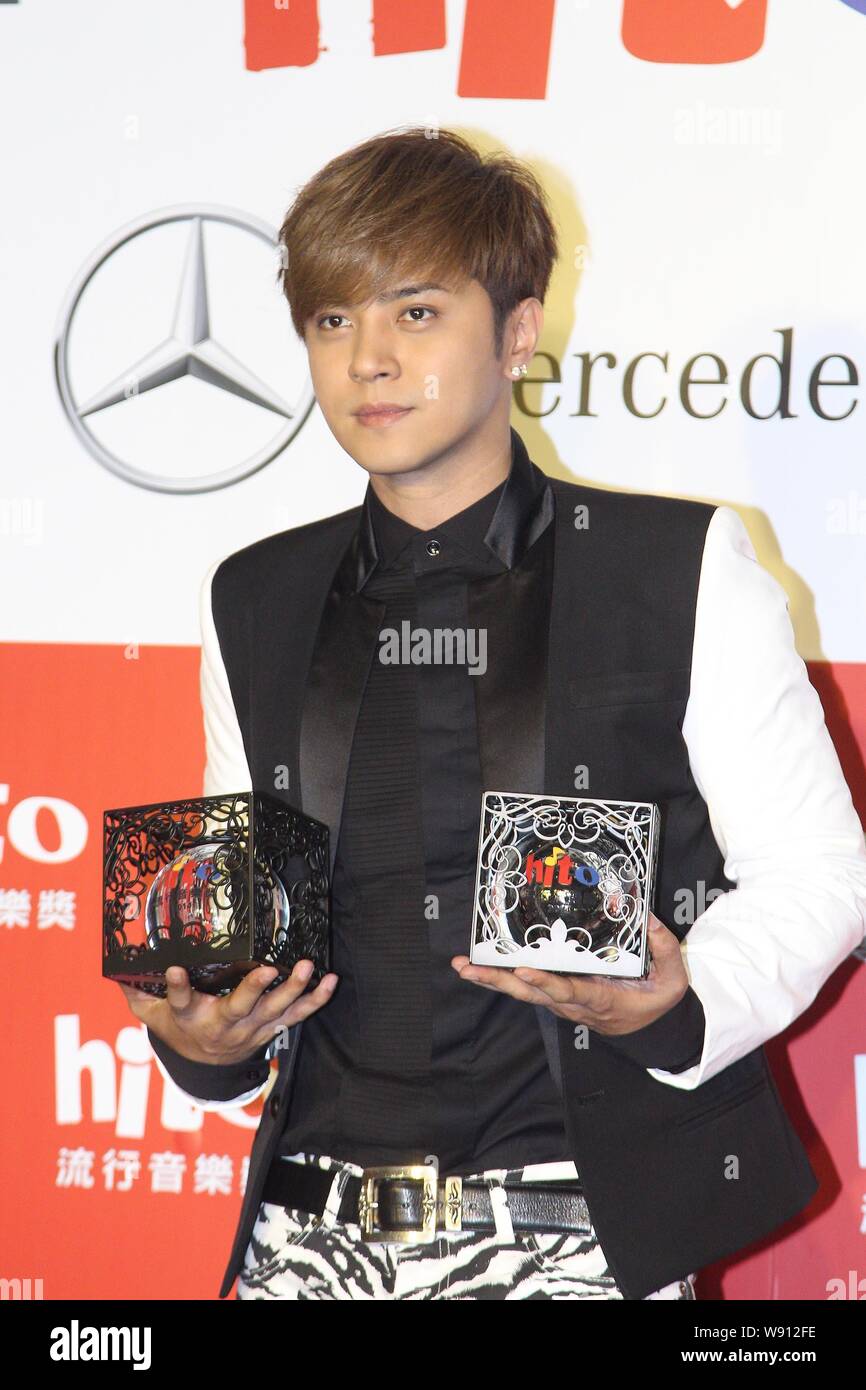 Taiwanese singer Show Lo poses with trophies during the 2014 Hito Music ...