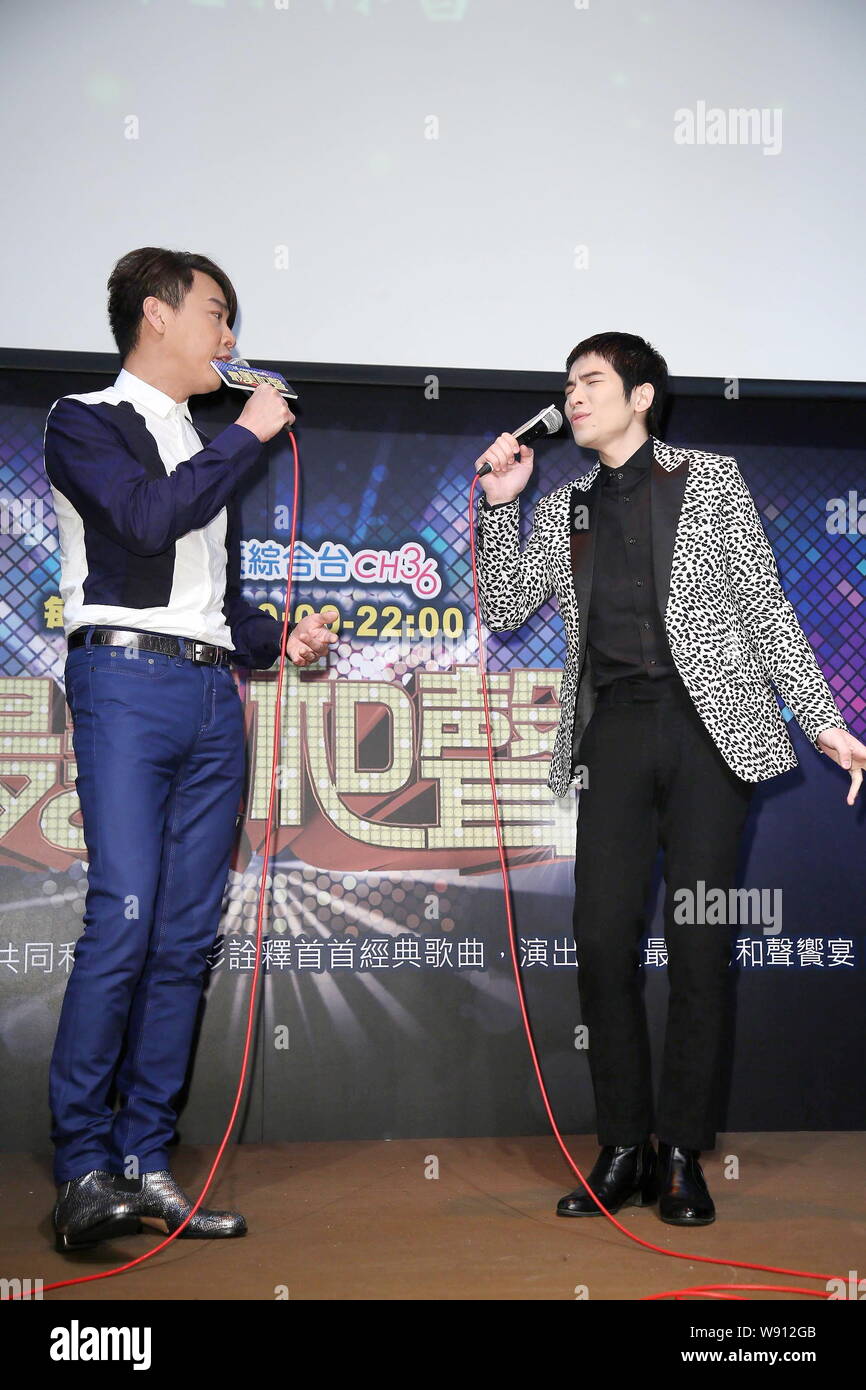 Taiwanese singers David Tao, left, and Jam Hsiao perform during a press ...