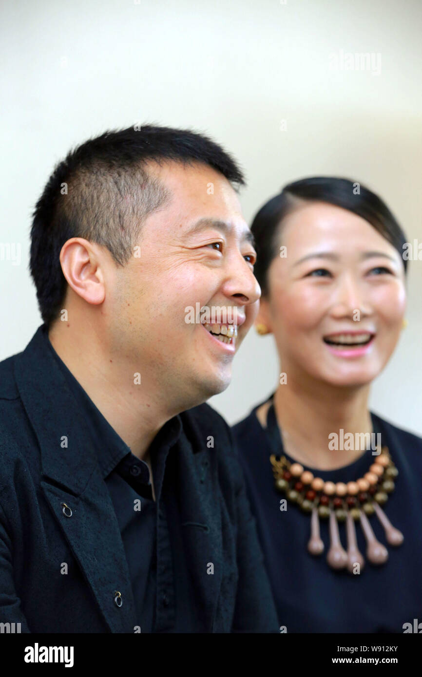Chinese director Jia Zhangke, left, and his actress wife Zhao Tao laugh ...