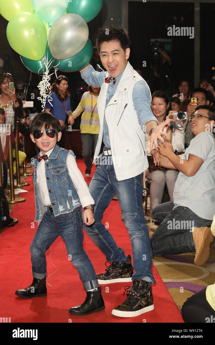 Taiwanese singer and actor Jimmy Lin, right, and his son Kimi pose ...