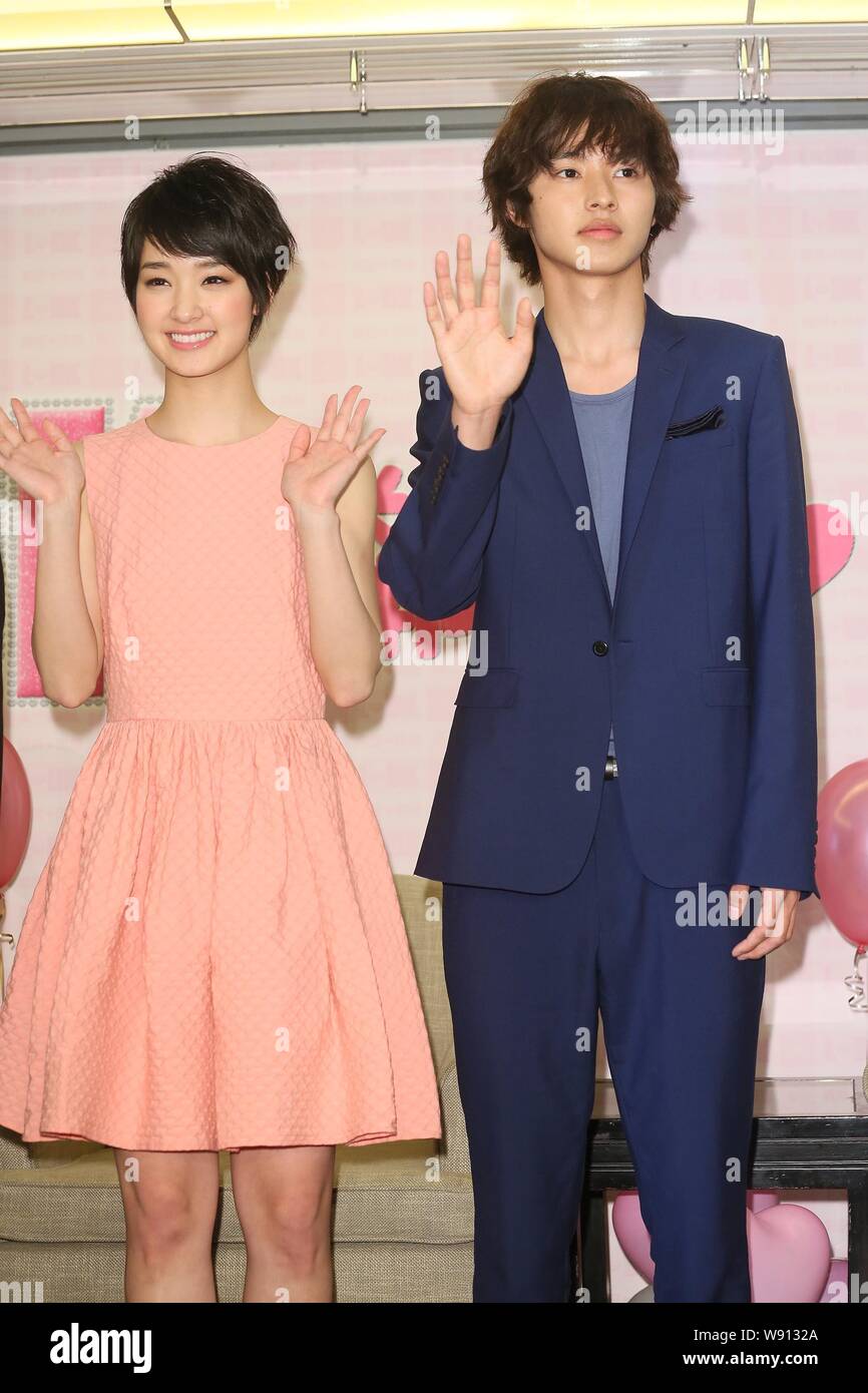 Japanese actress Ayame Goriki, left, and actor Kento Yamazaki wave ...