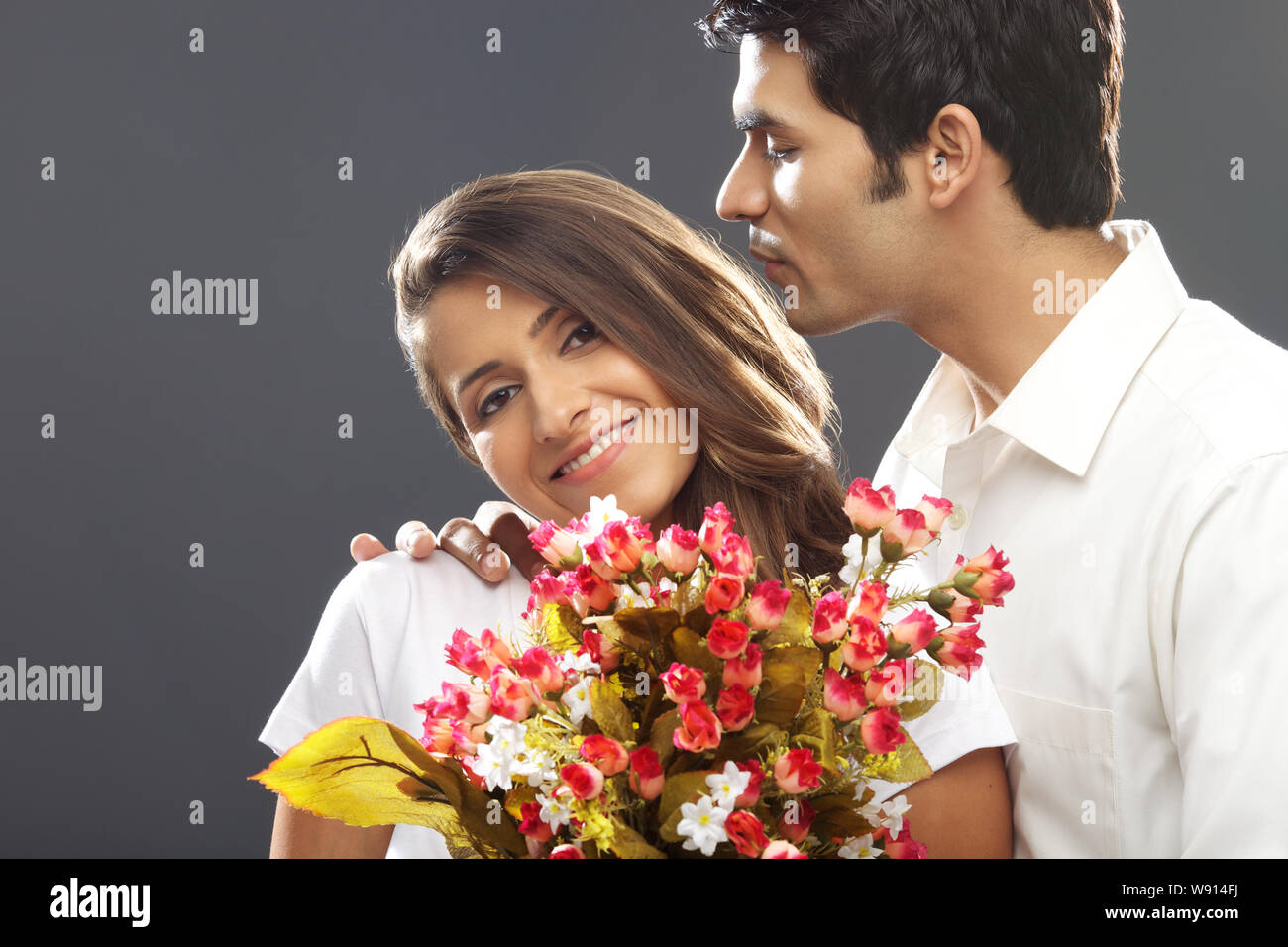 Young couple romancing Stock Photo - Alamy