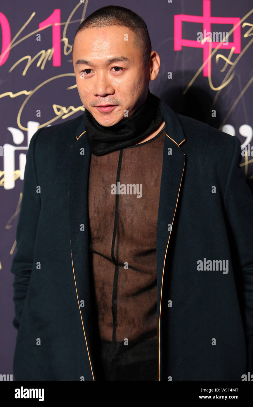 --FILE--Chinese actor Gao Hu poses on the red carpet as he arrives at ...