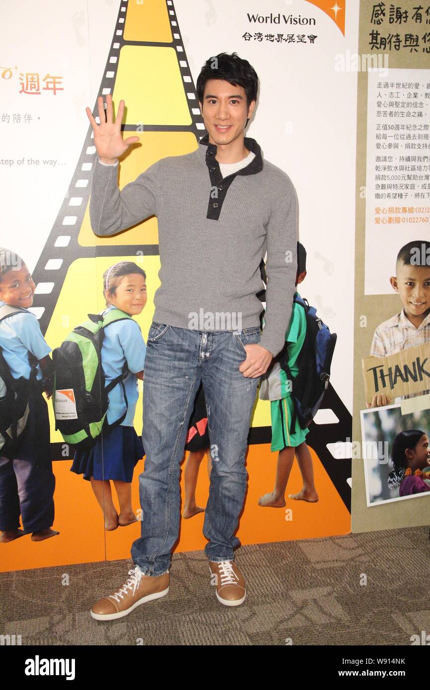 Taiwanese singer Leehom Wang waves during the 50th Anniversary of World ...