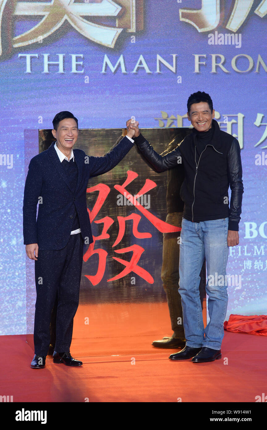 Hong Kong actors Nick Cheung, left, and Chow Yun-fat, pose during a ...