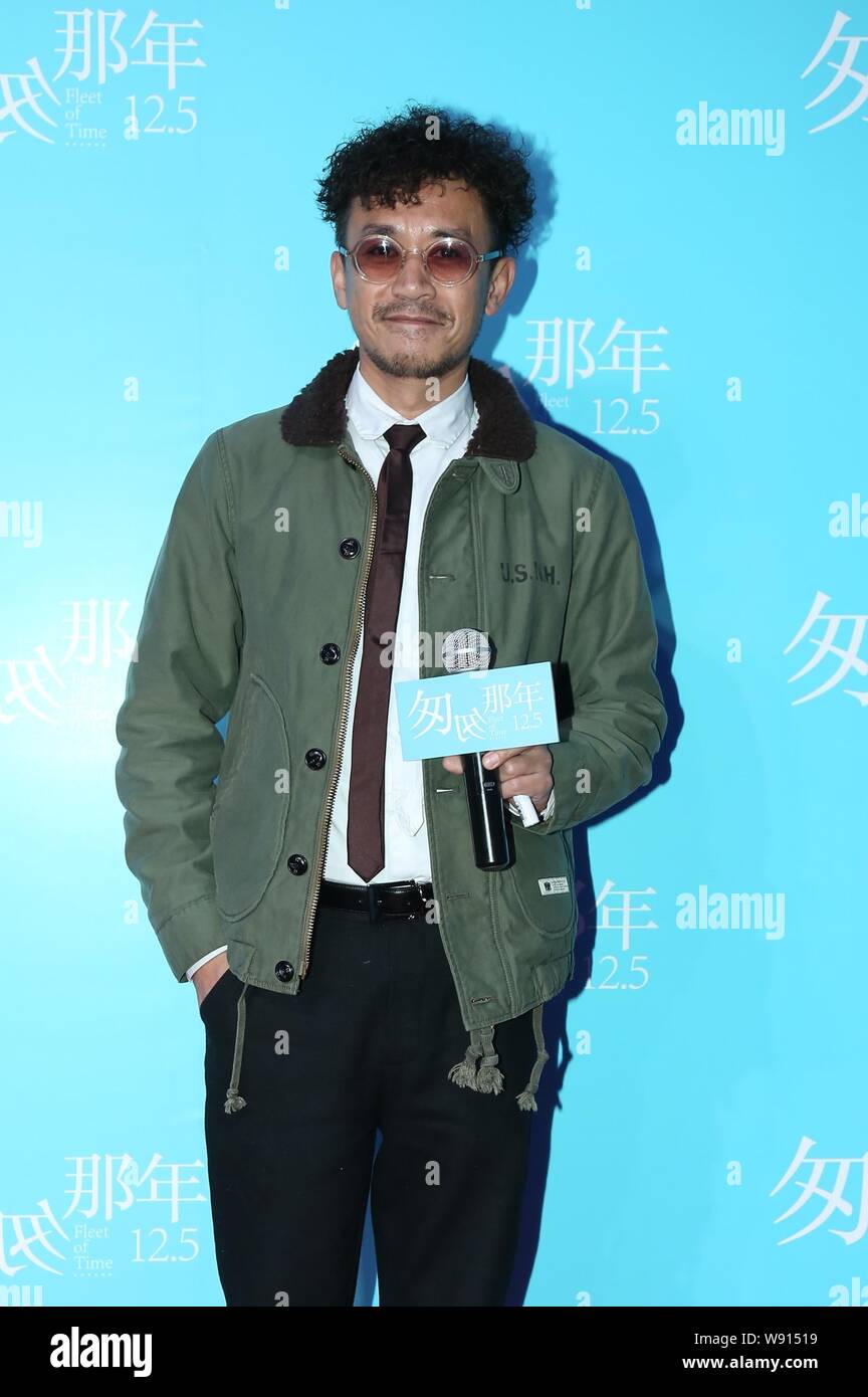 Chinese actor Wang Xuebin poses on the red carpet as he arrives for the ...