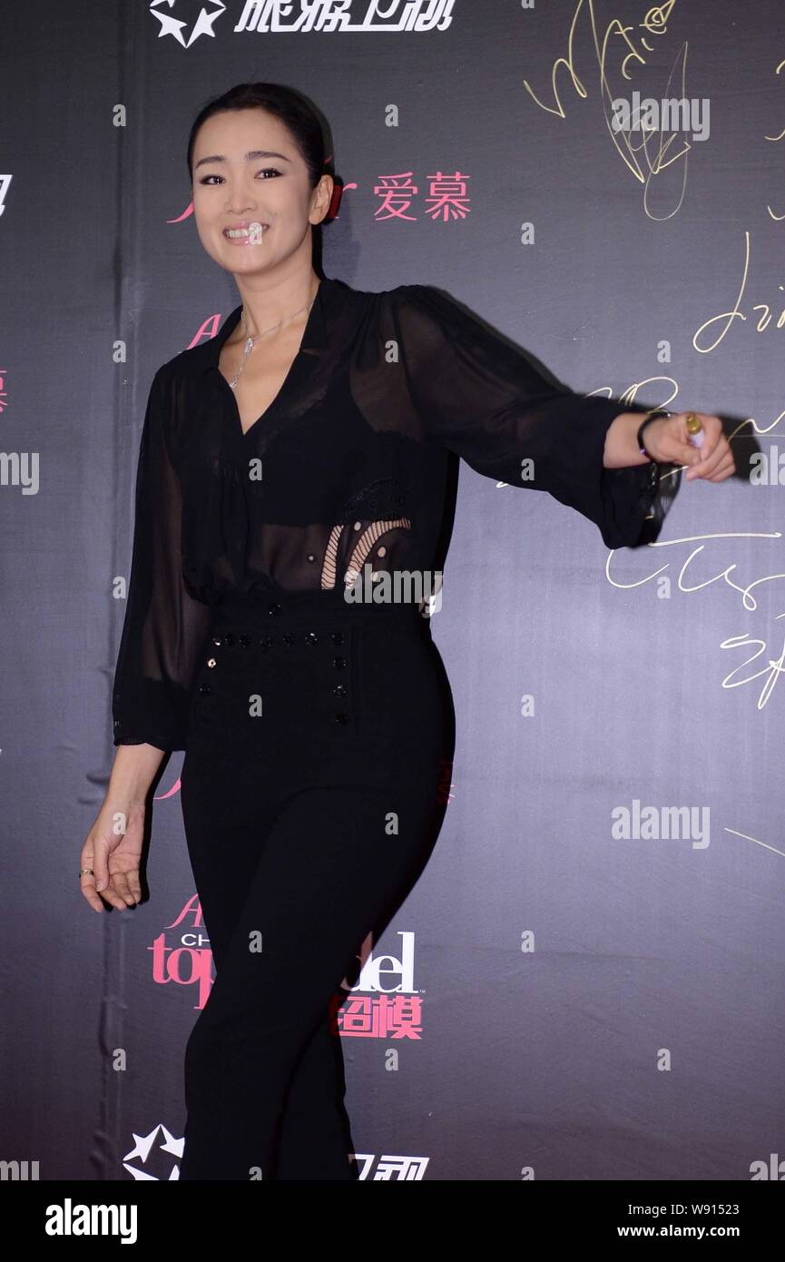 --FILE--Chinese actress Gong Li poses on the red carpet as she arrives ...