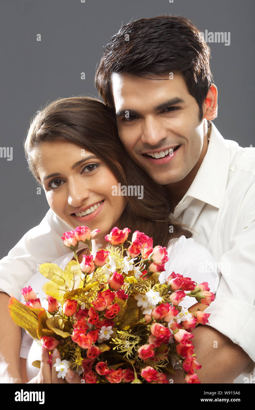 Young couple romancing Stock Photo - Alamy
