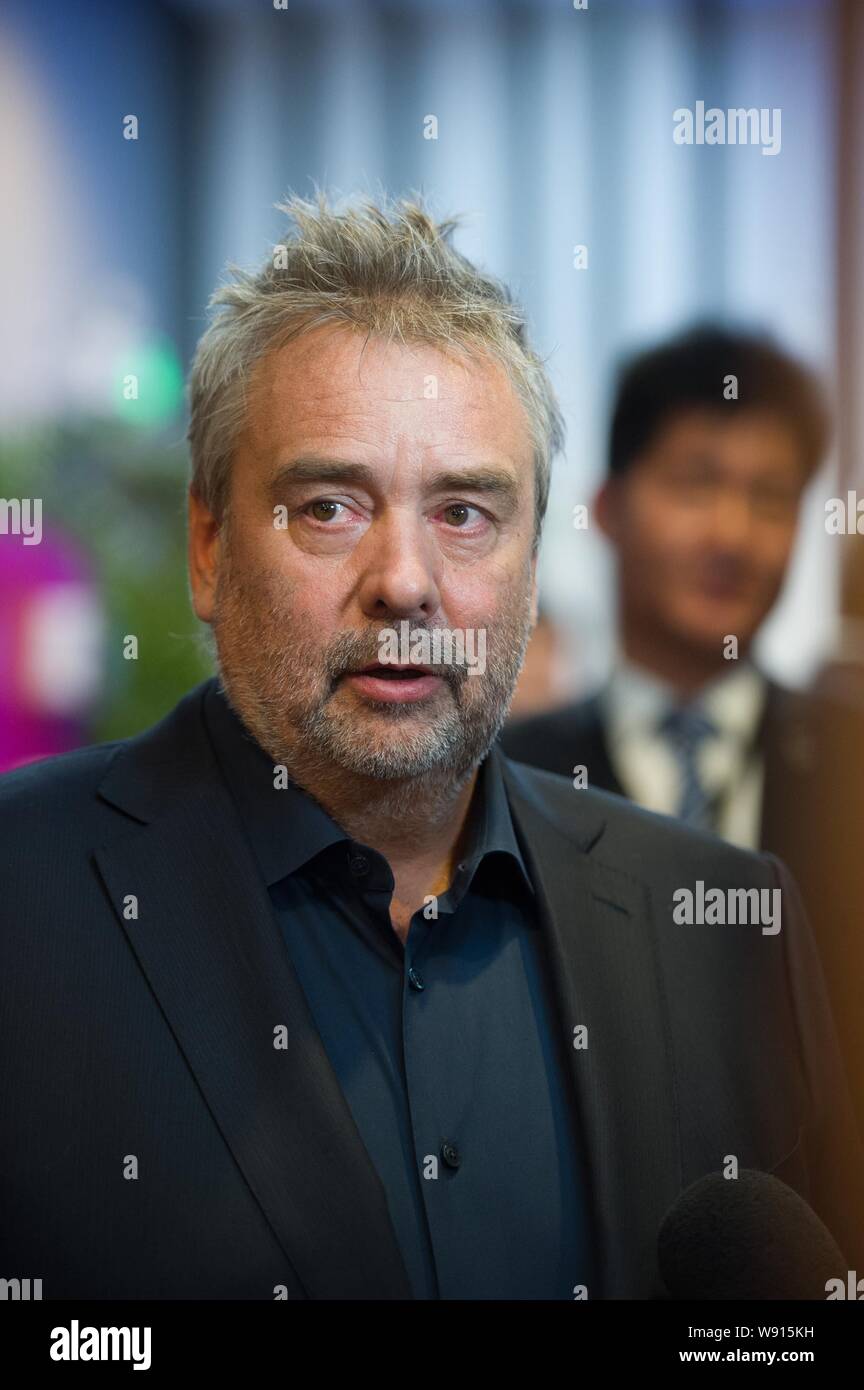 French director Luc Besson is interviewed during the Beijing premiere ...