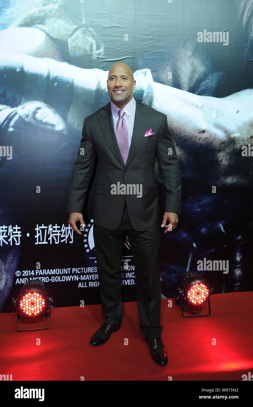 American actor Dwayne Johnson poses during a premiere for his new movie ...
