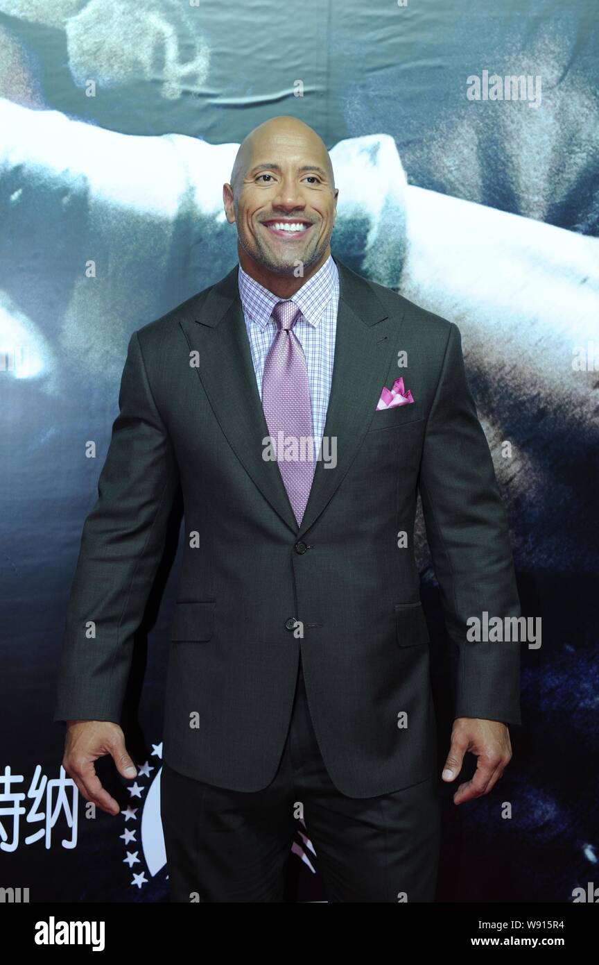 American actor Dwayne Johnson poses during a premiere for his new movie ...