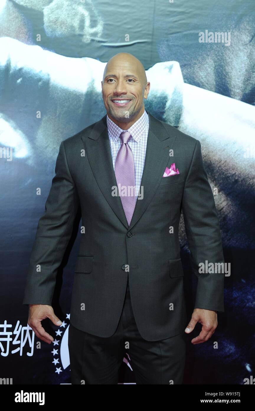 American actor Dwayne Johnson poses during a premiere for his new movie ...