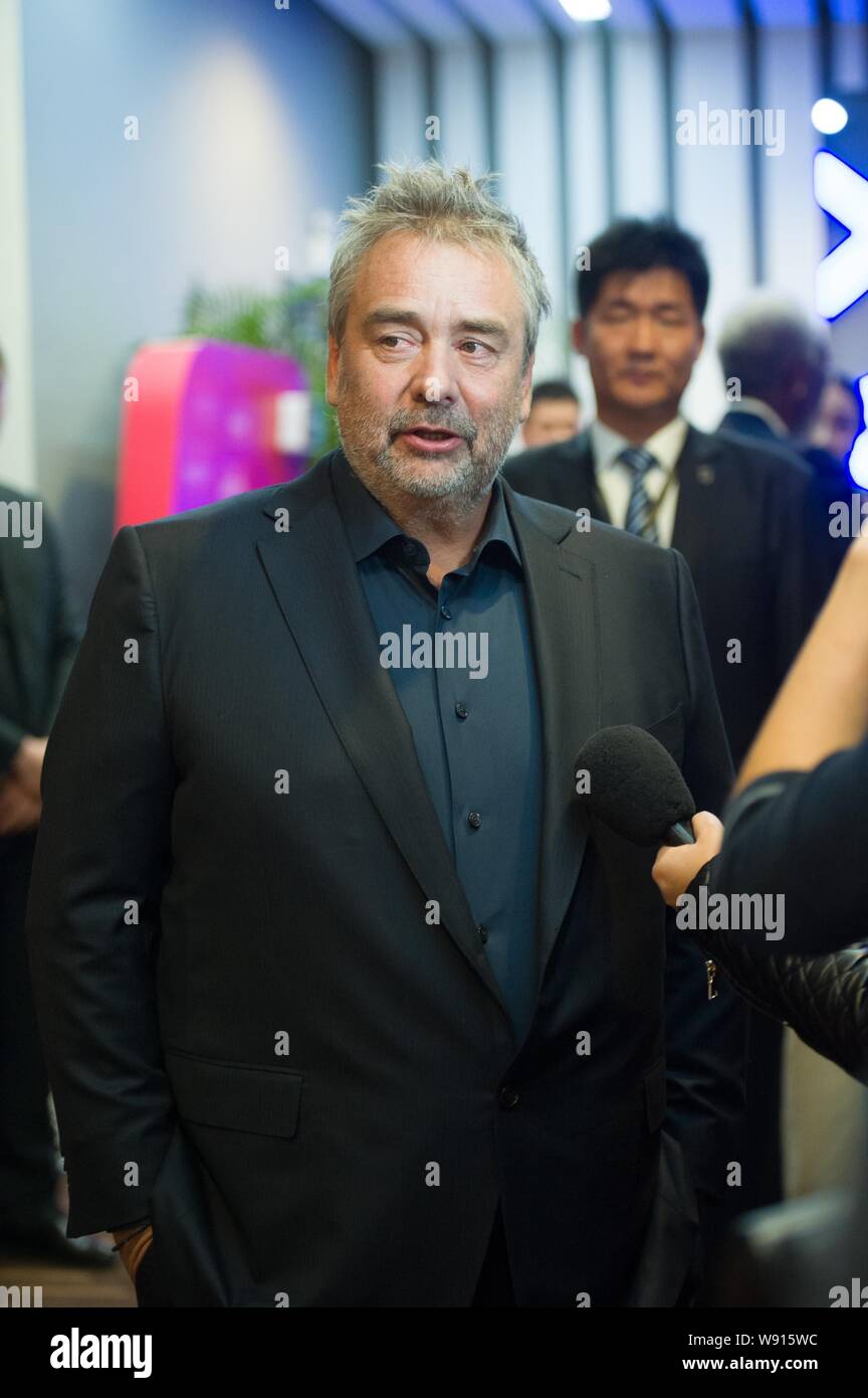 French director Luc Besson is interviewed during the Beijing premiere ...