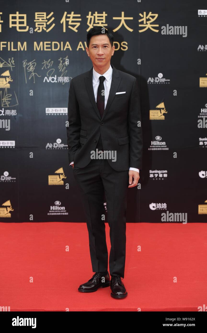 Hong Kong actor Nick Cheung Ka-fai poses on the red carpet for the 14th ...