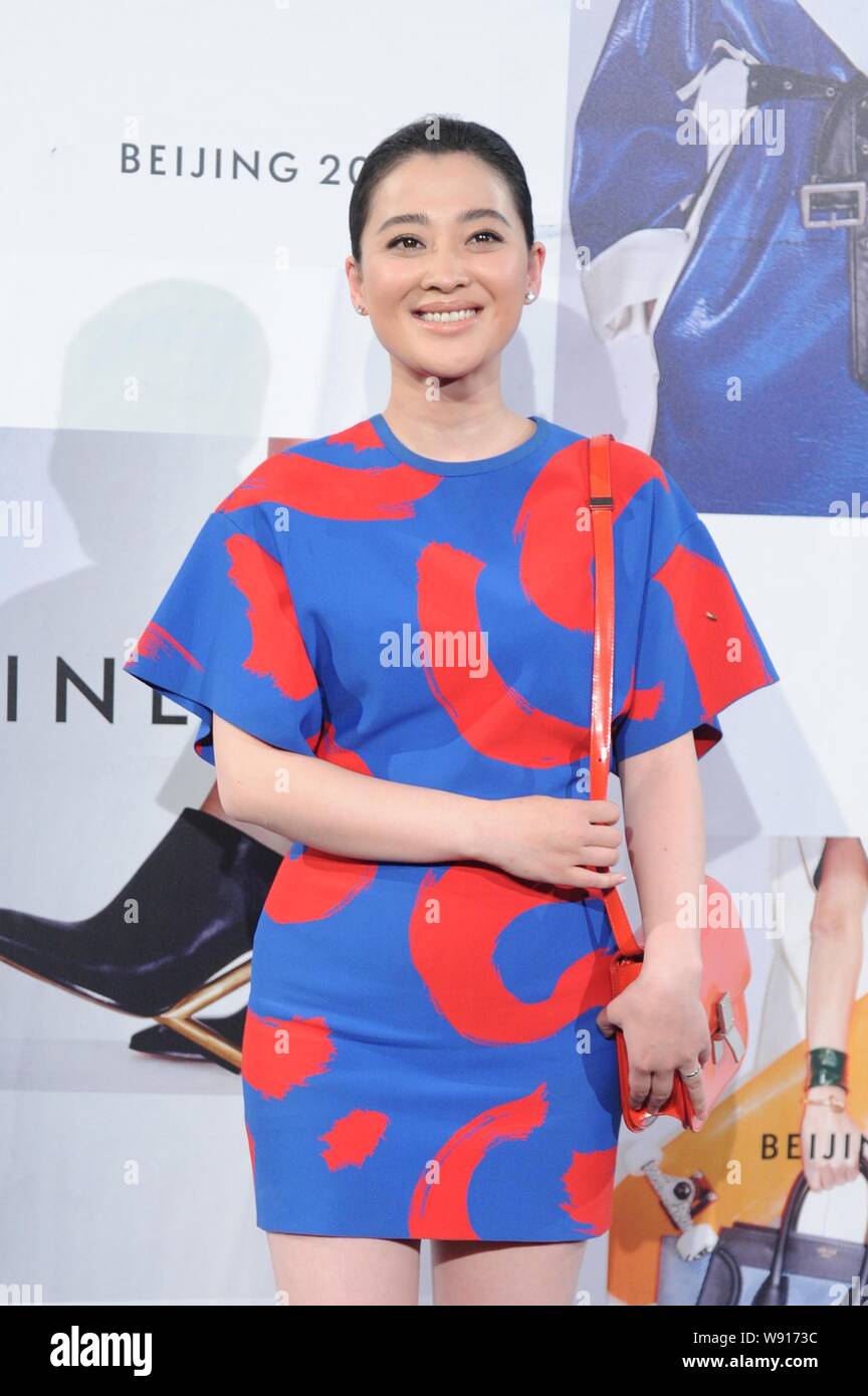 Chinese actress Mei Ting poses as she arrives at the Celine 2014 Fall ...