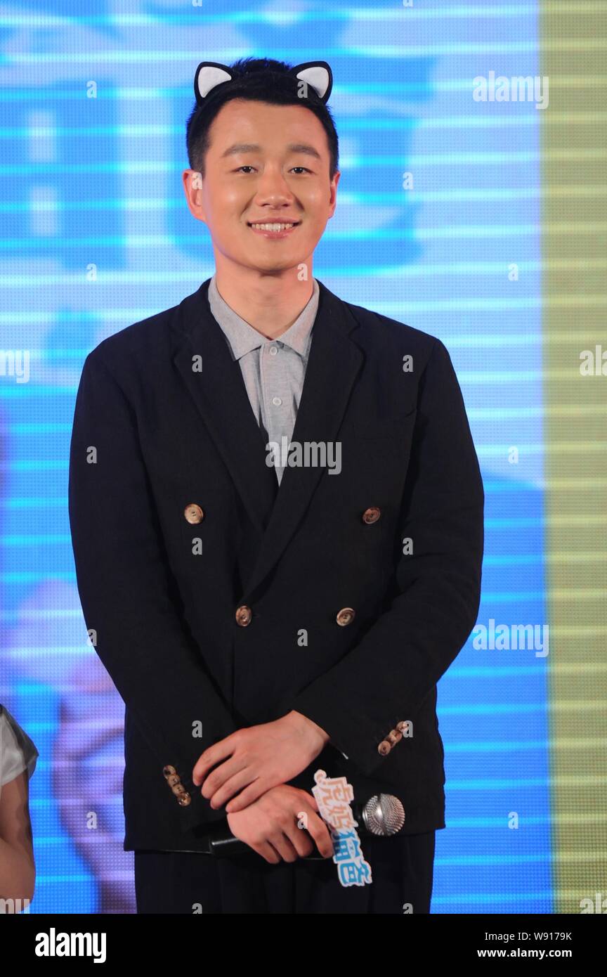 Chinese actor Tong Dawei smiles during a press conference to start the ...