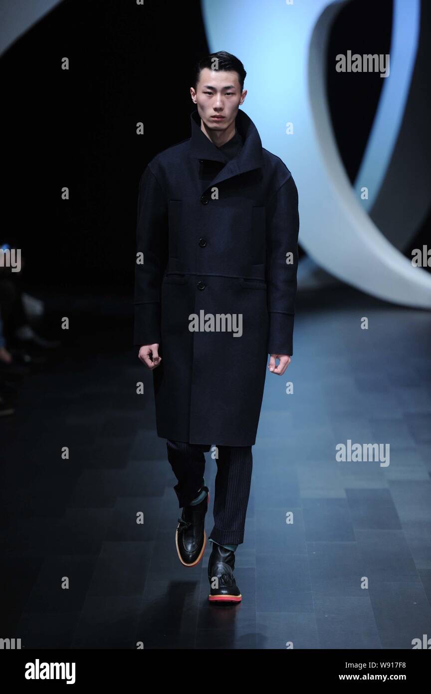 A model displays a new creation by Chinese fashion designer Wang Yutao at the Beauty Berry Wang ...