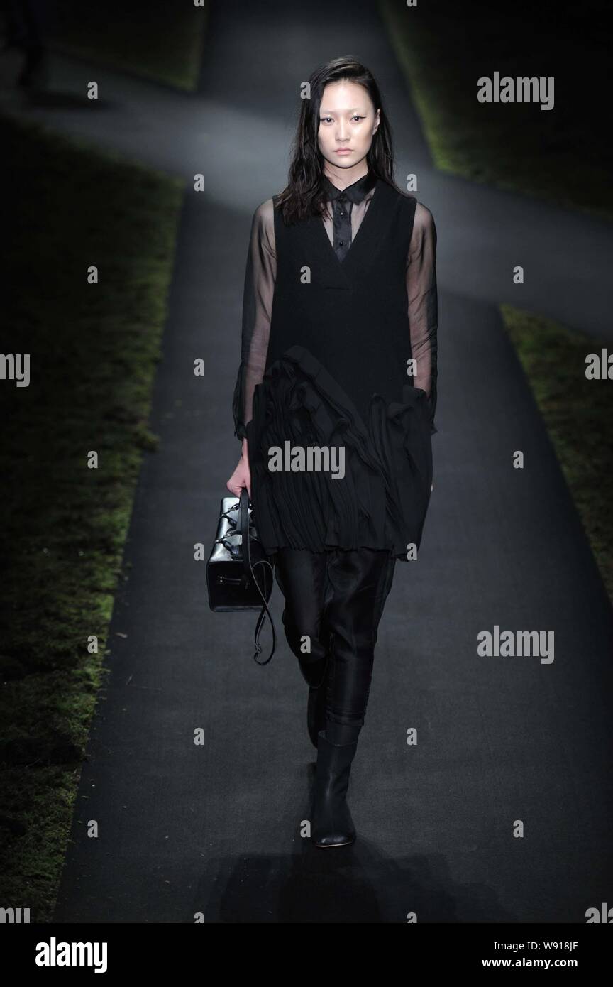 A model displays a new creation at the Ban Xiao Xue collection Fashion ...