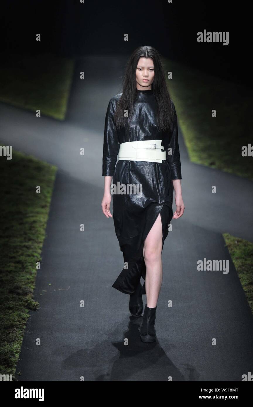 A model displays a new creation at the Ban Xiao Xue collection Fashion ...