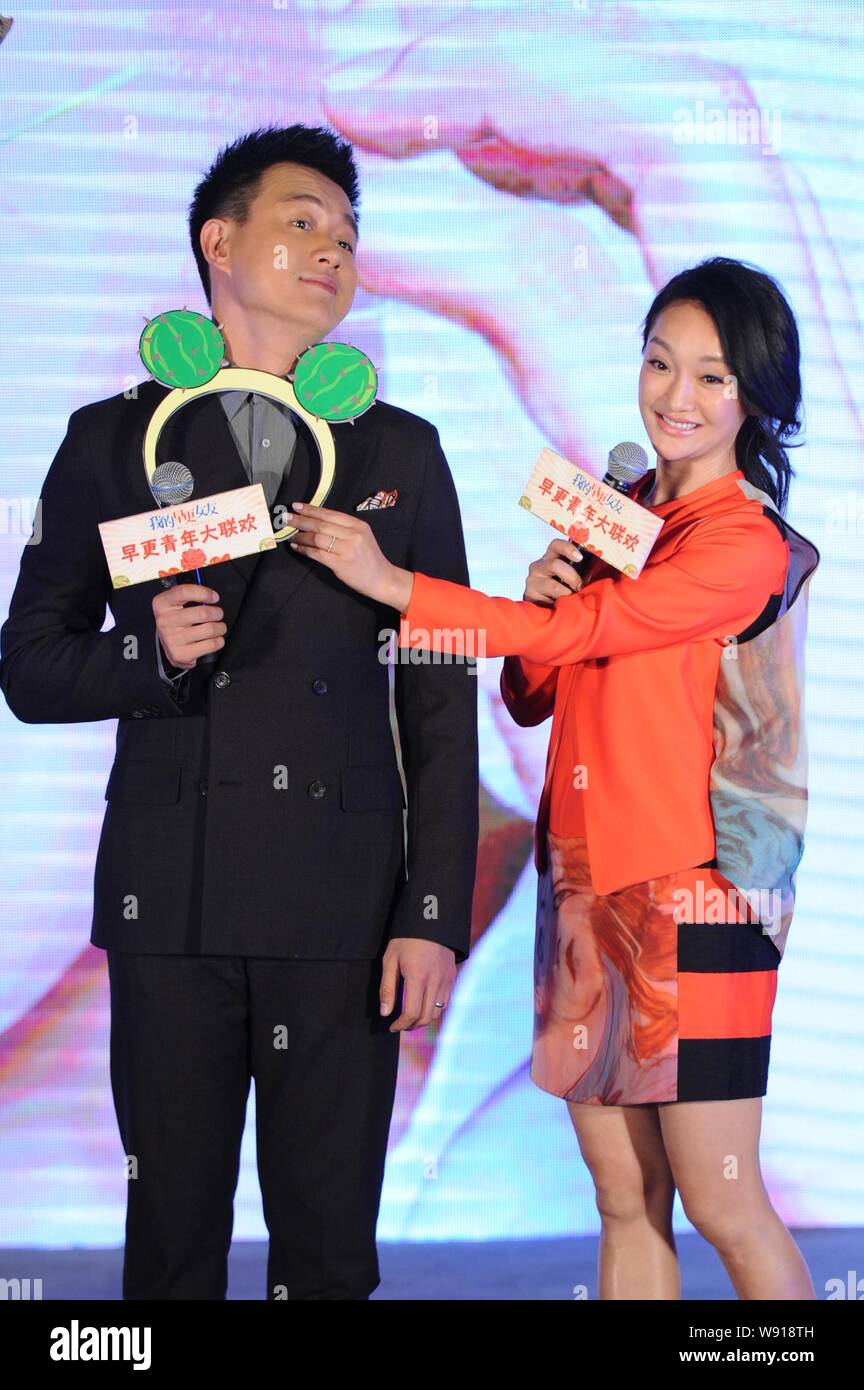 Chinese actress Zhou Xun, right, and actor Tong Dawei pose during a ...