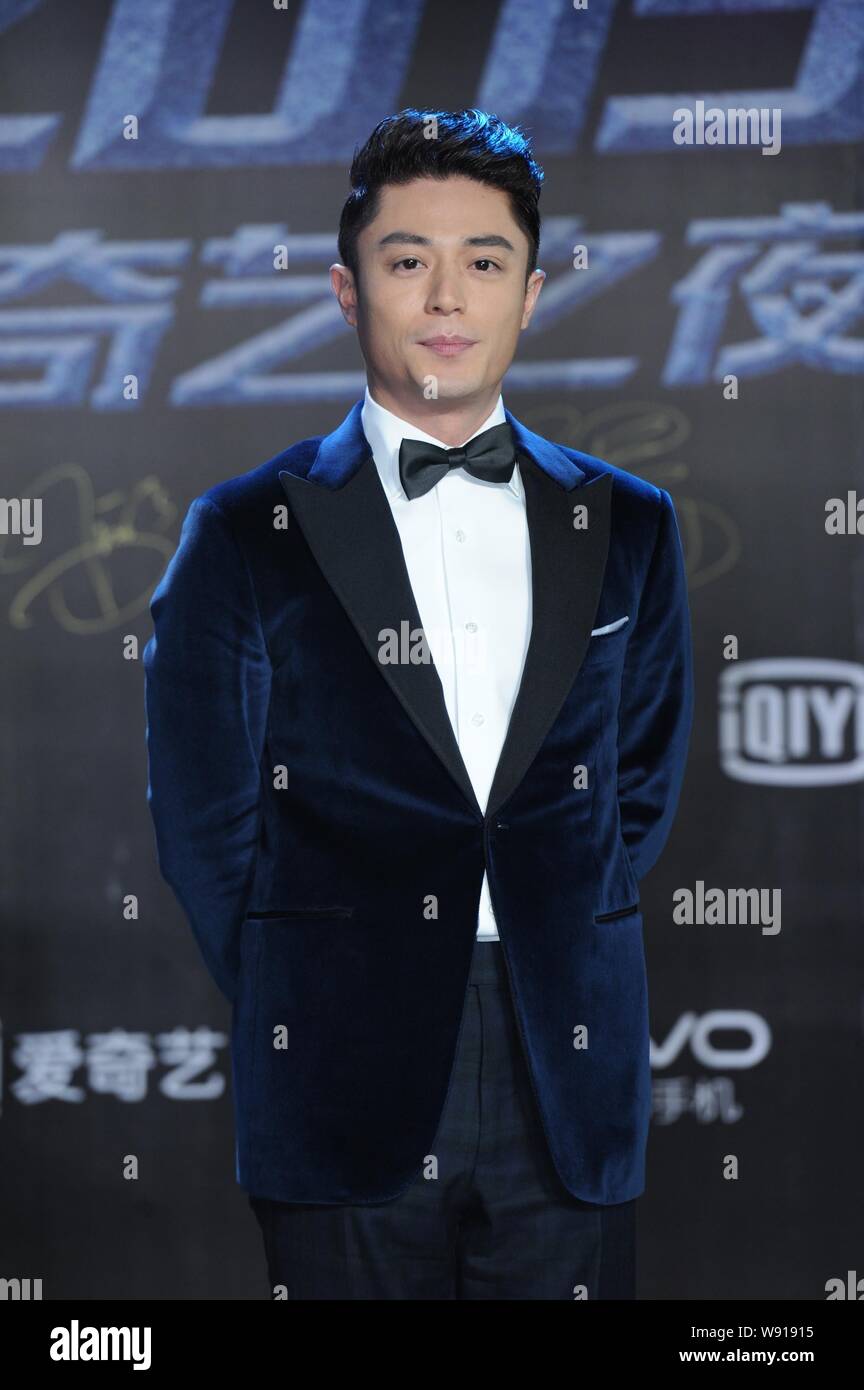 Taiwanese actor Wallace Huo poses during a fashion event by iQIYI in ...