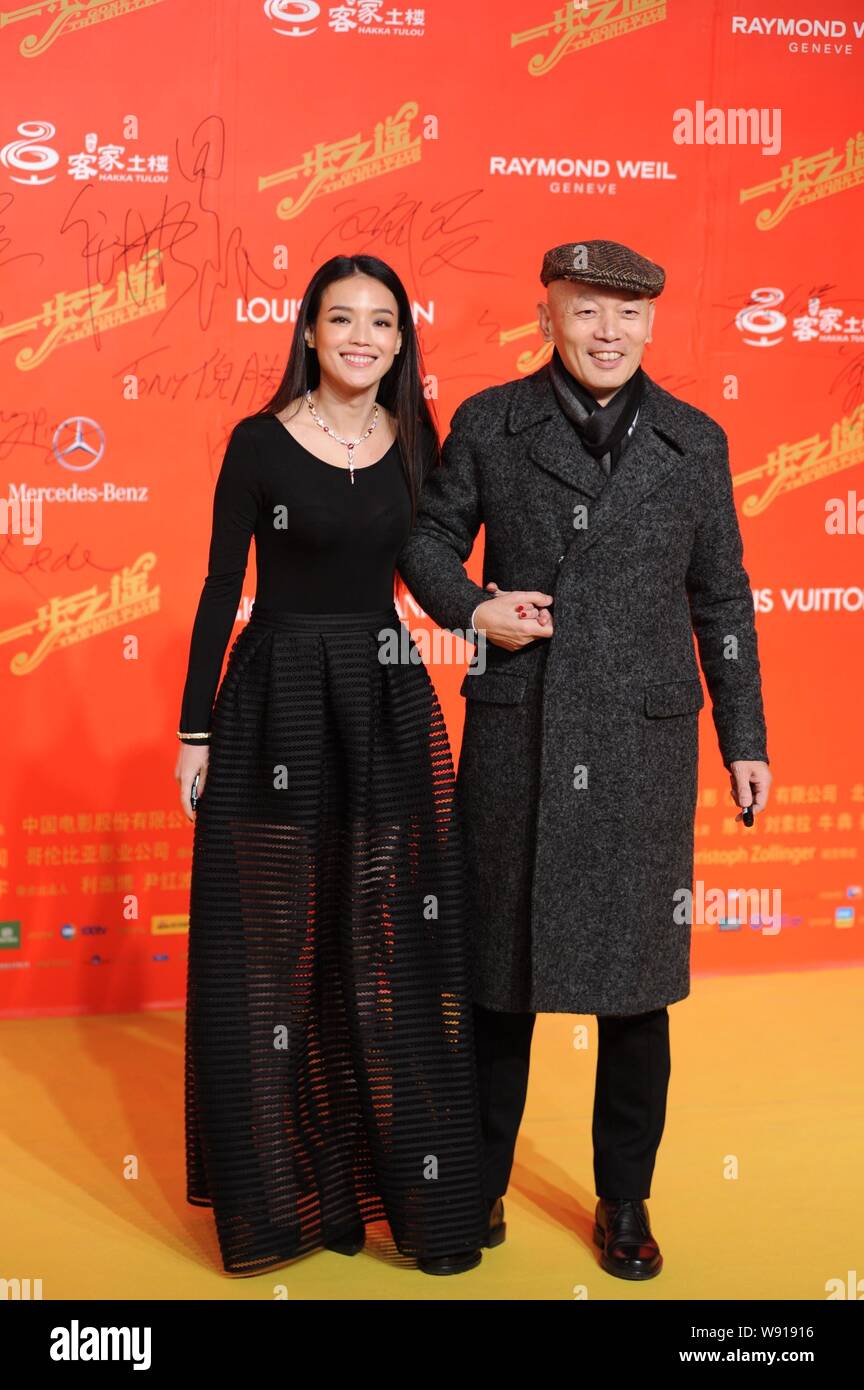 Taiwanese actress Shu Qi, left, holds hands with Chinese actor Ge You ...